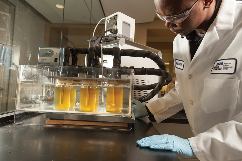 Proppant-sized solid inhibitors improve flow assurance in fraced wells