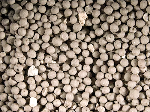 Proppant-sized solid inhibitors improve flow assurance in fraced wells