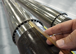 Intelligent tracers quantify in-flow characteristics in multi-zone ...